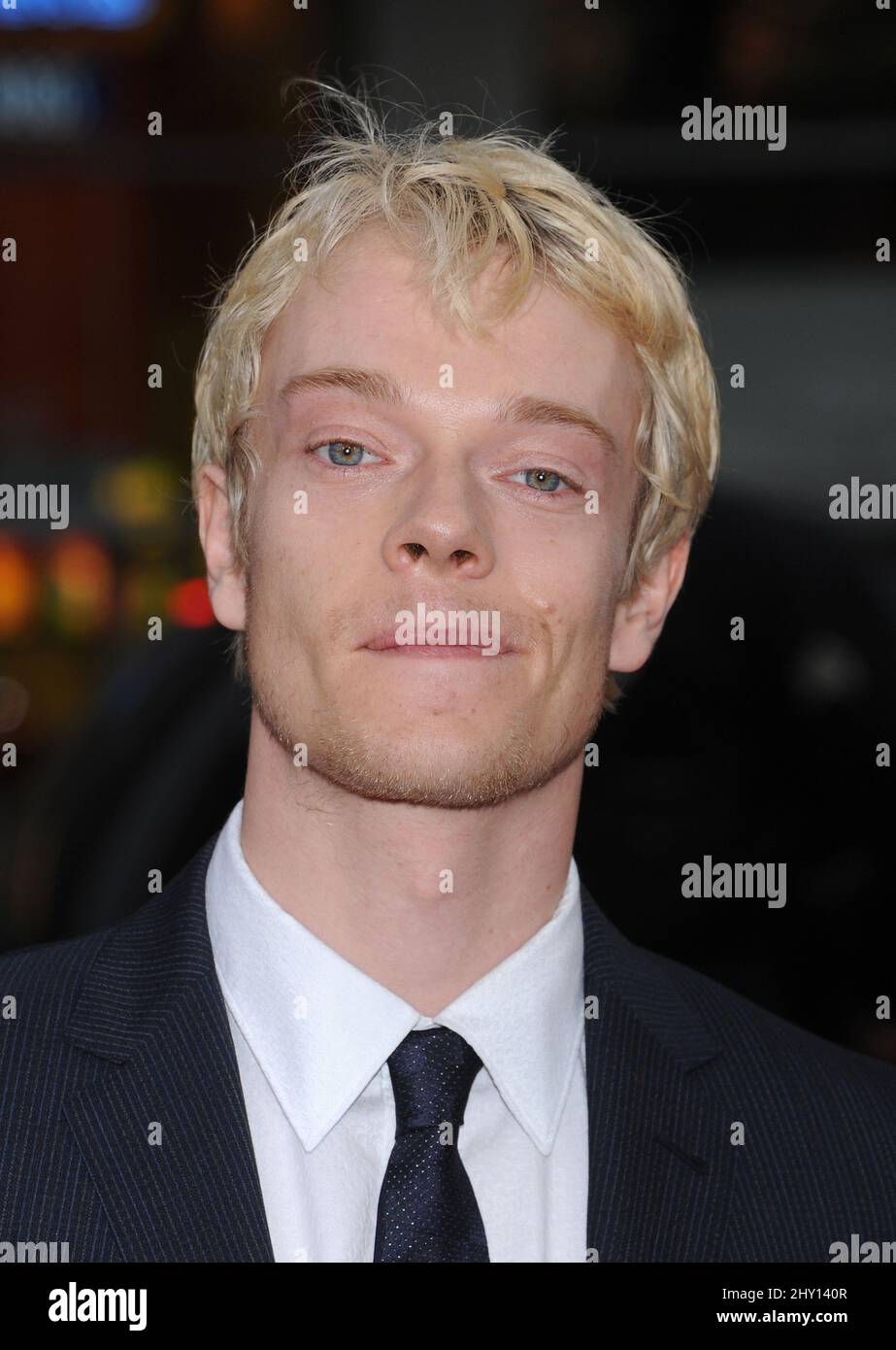 Alfie Allen attending the season 3 premiere of the show "Game Of ...