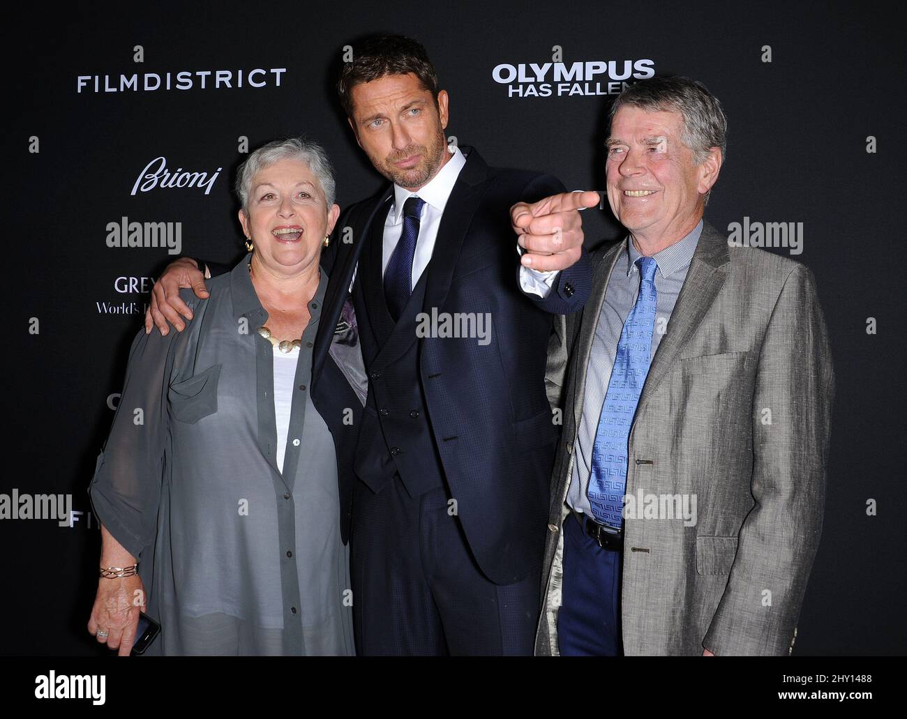 Gerard Butler & Parents attending the premiere of "Olympus Has Fallen ...