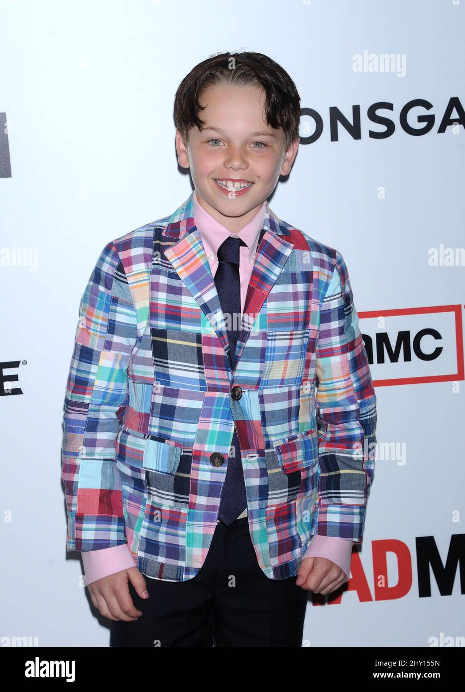 Mason Vale Cotton attending a photocall for the premiere of season six ...