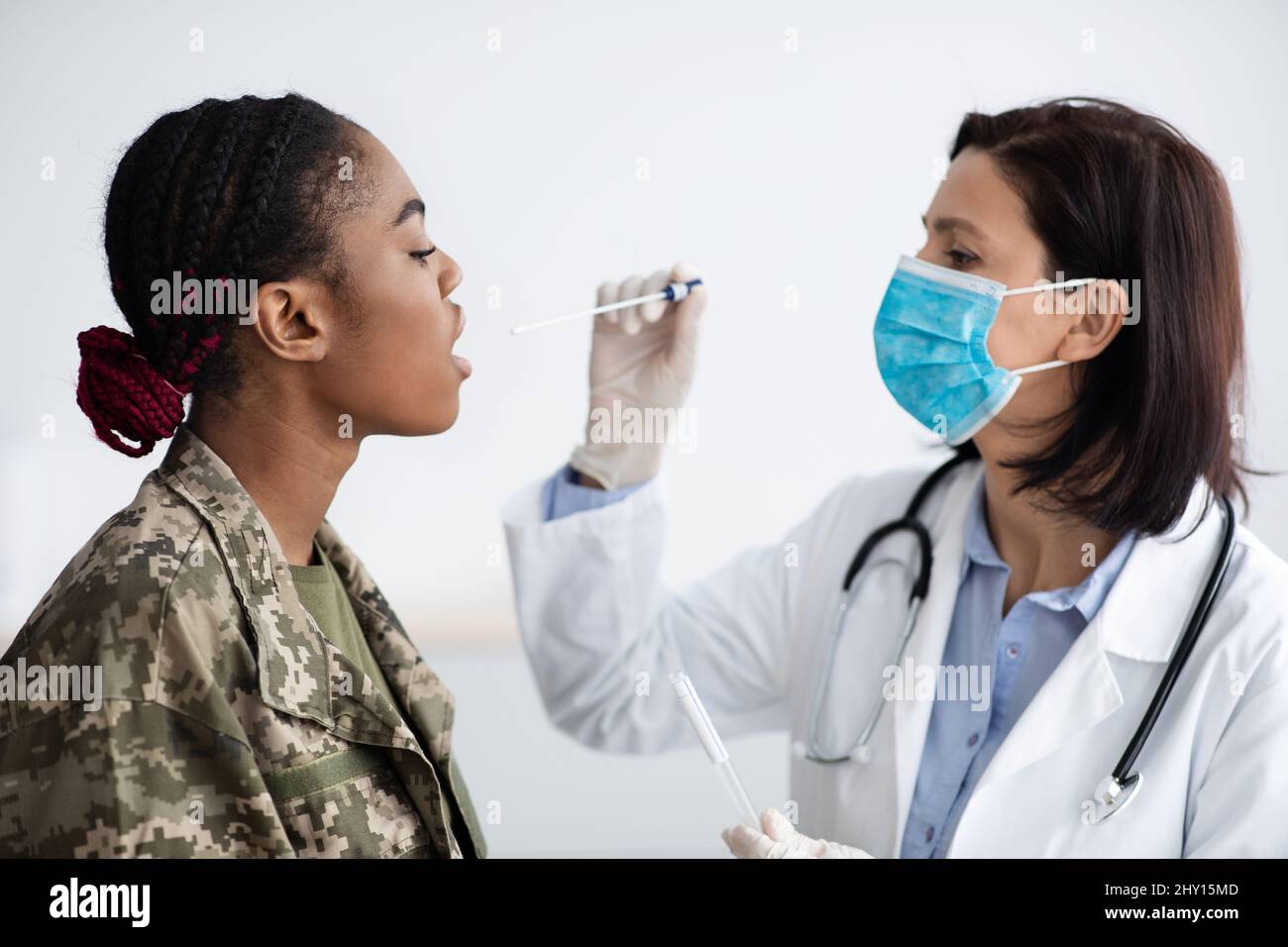 PCR Coronavirus Test. Doctor Taking Swab From Black Military Female's ...