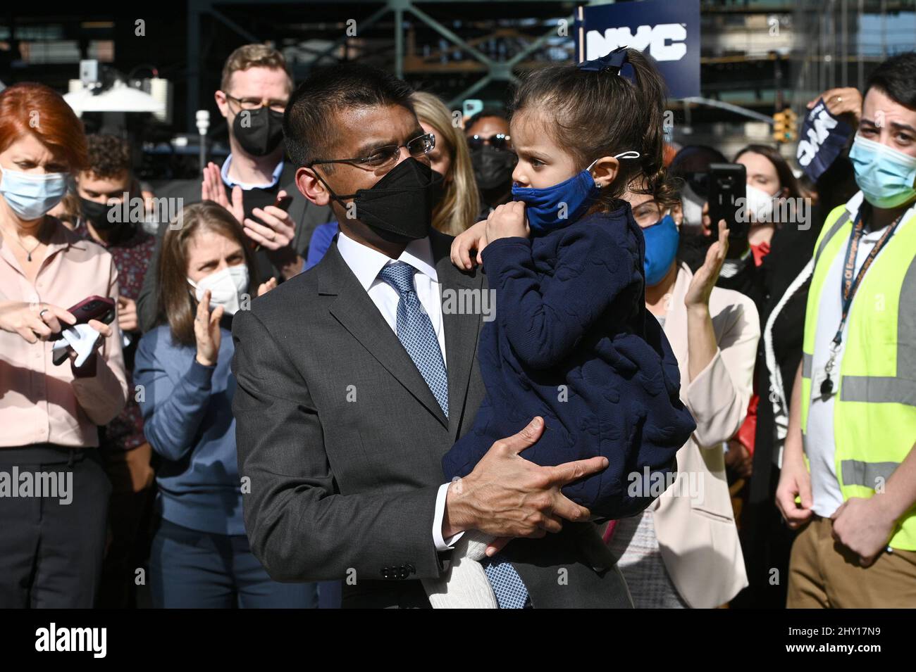 New York, USA. 14th Mar, 2022. Carrying his daughter Ava Lucia on his ...