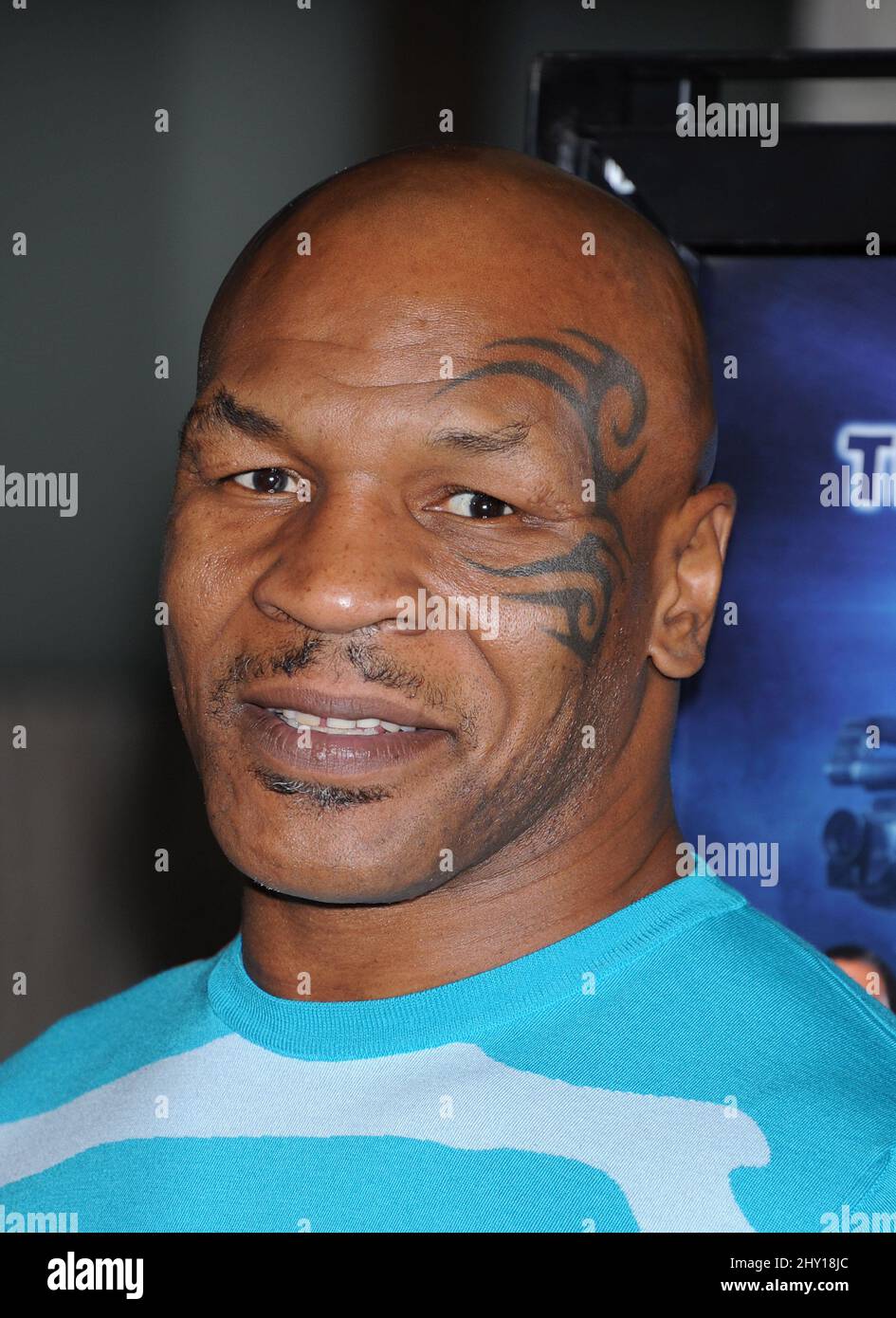 Mike Tyson attends the premiere of Scary Movie V shown at the Cinerama ...