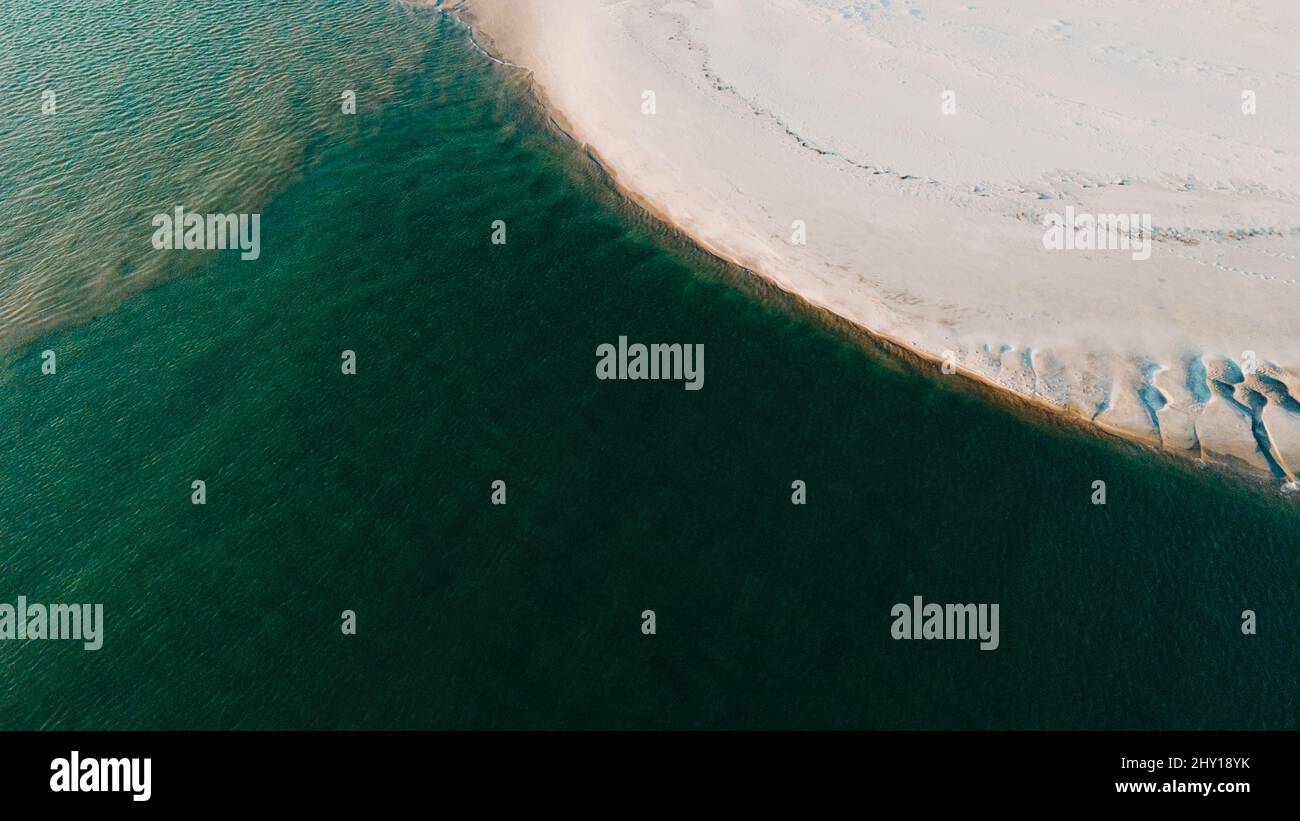 Aerial view of the sandy beach and turquoise water in Murrells Inlet ...
