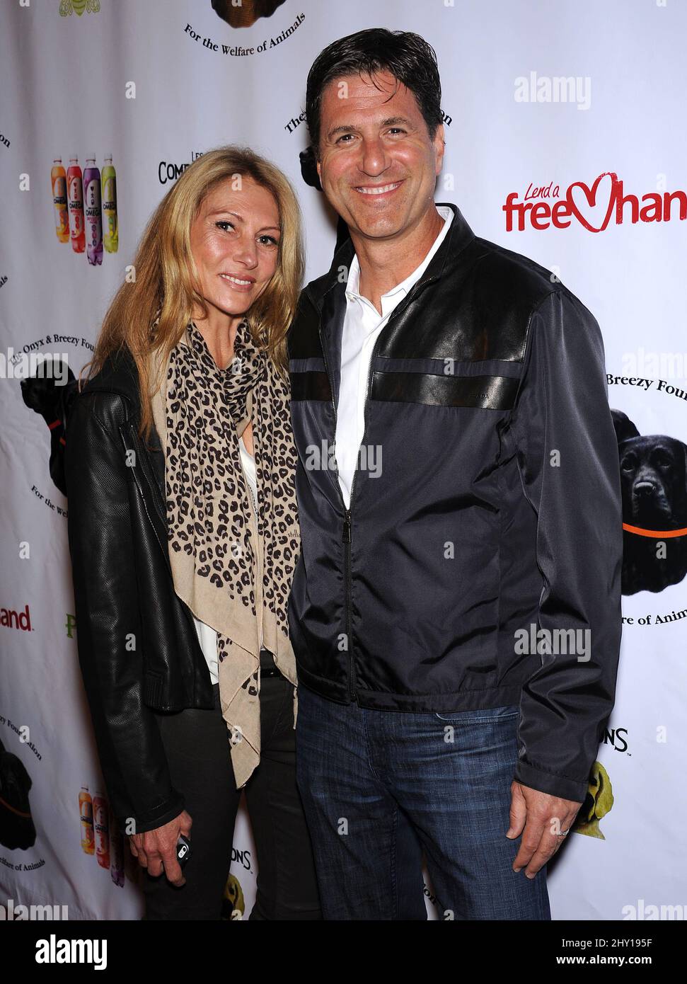 Steve Leuitan & wife Krista attending the Saving Tails Gala held at a ...