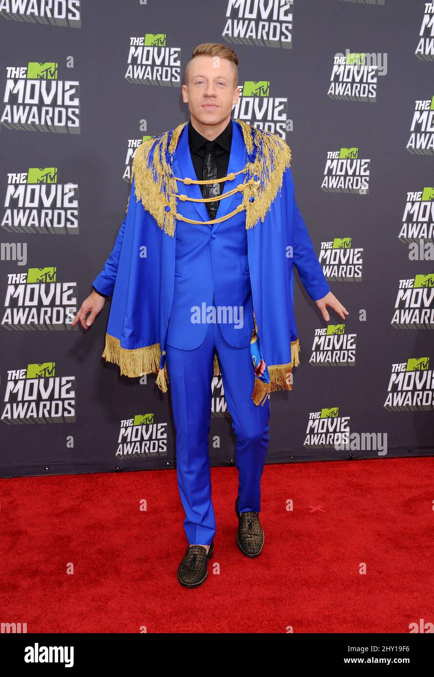 Macklemore arrives at the 2013 MTV Movie Awards at Sony Pictures ...