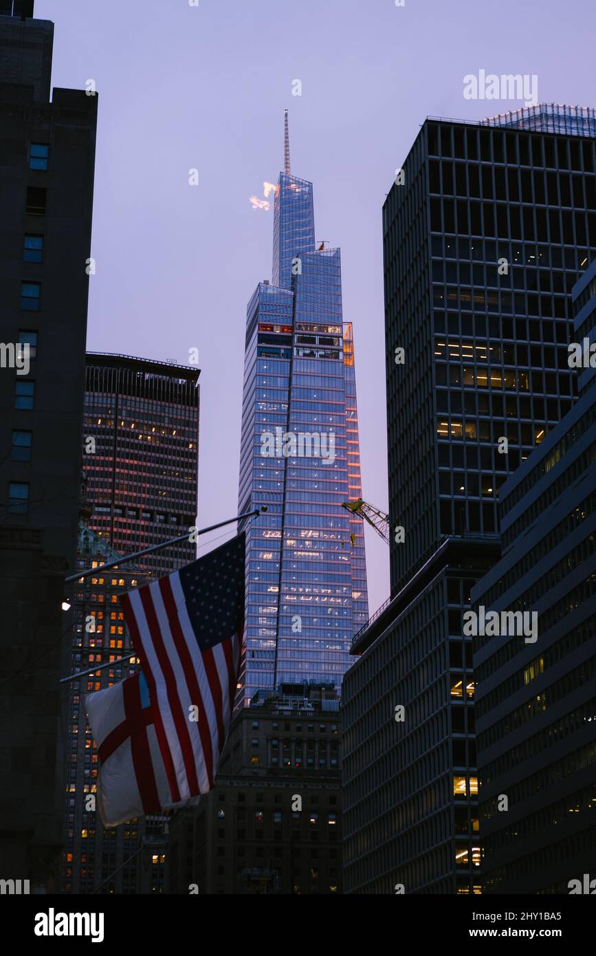 High rise Bank of America Tower with glass walls located on street of ...