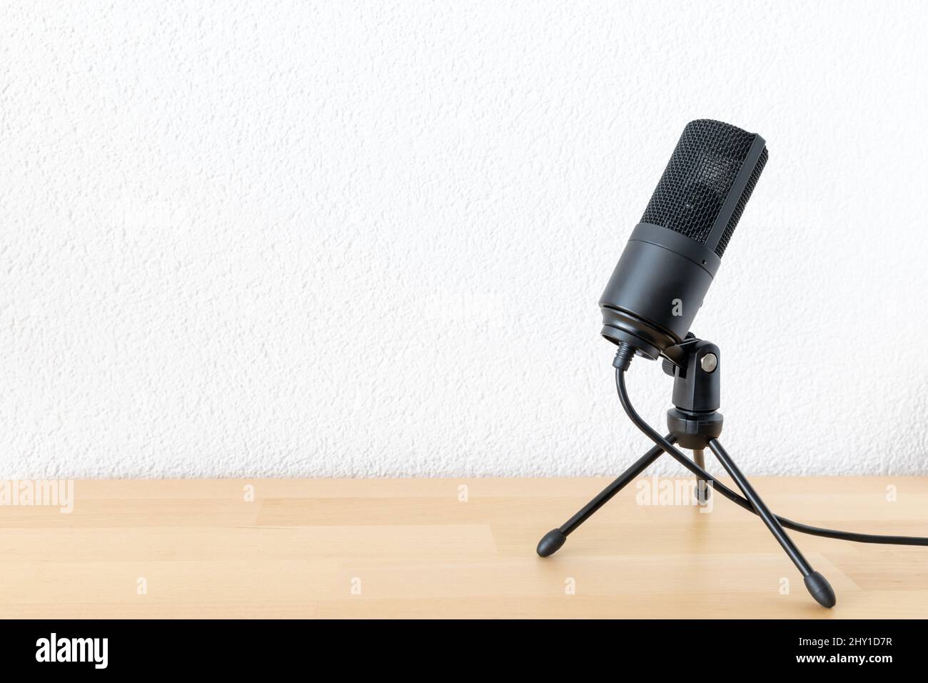 Typical microphone isolated on white background Stock Photo - Alamy