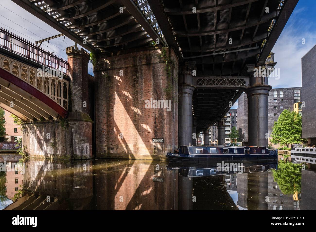 View of historic bridges in the morning sunlight of the Castlefield ...
