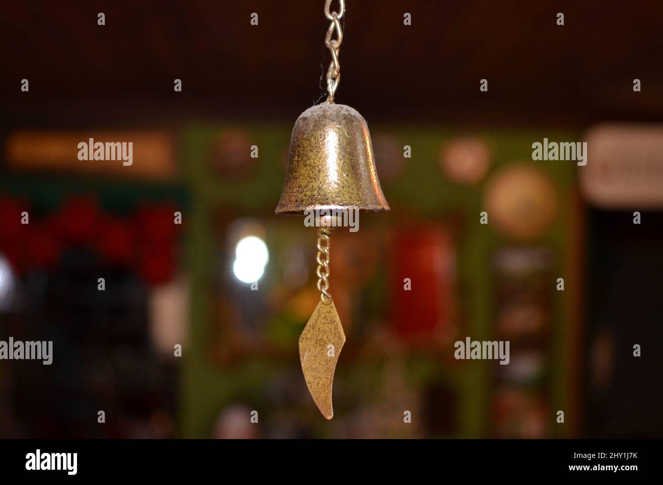 Closeup shot of a hanging rusty bronze bell Stock Photo - Alamy