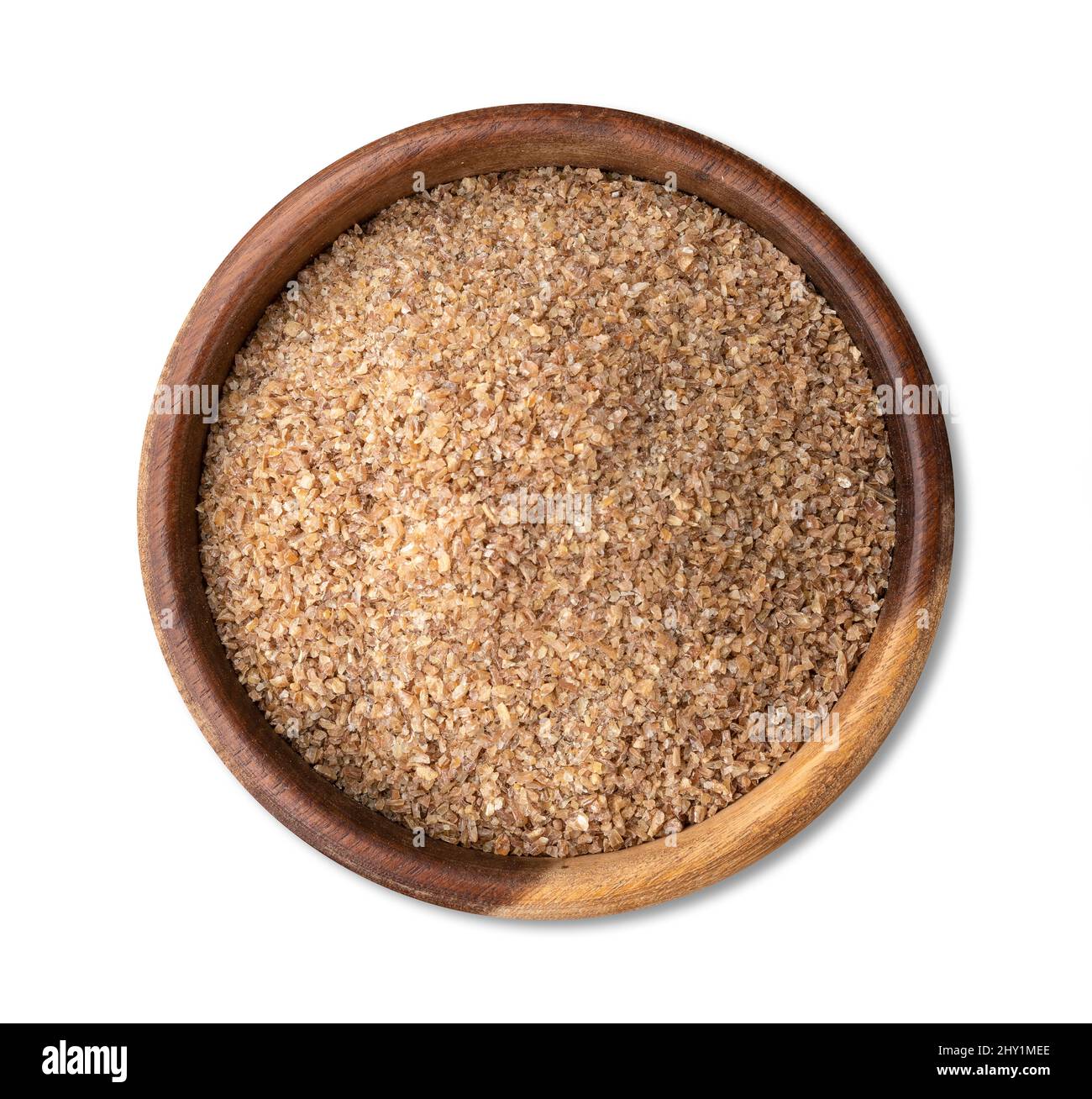 Ground whole wheat in a bowl isolated over white background Stock Photo ...