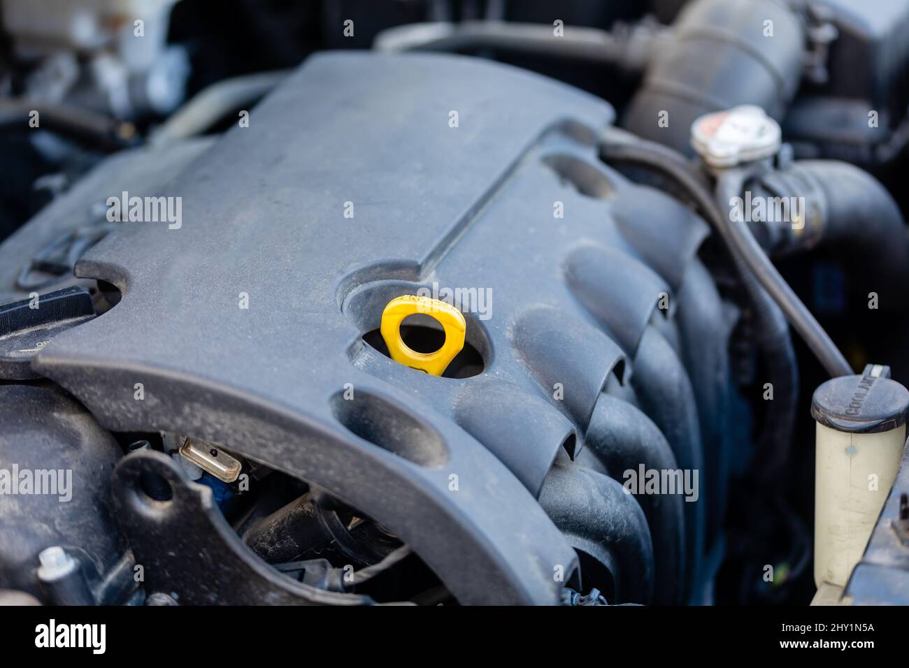 Closeup of the oil tank of a car Stock Photo - Alamy