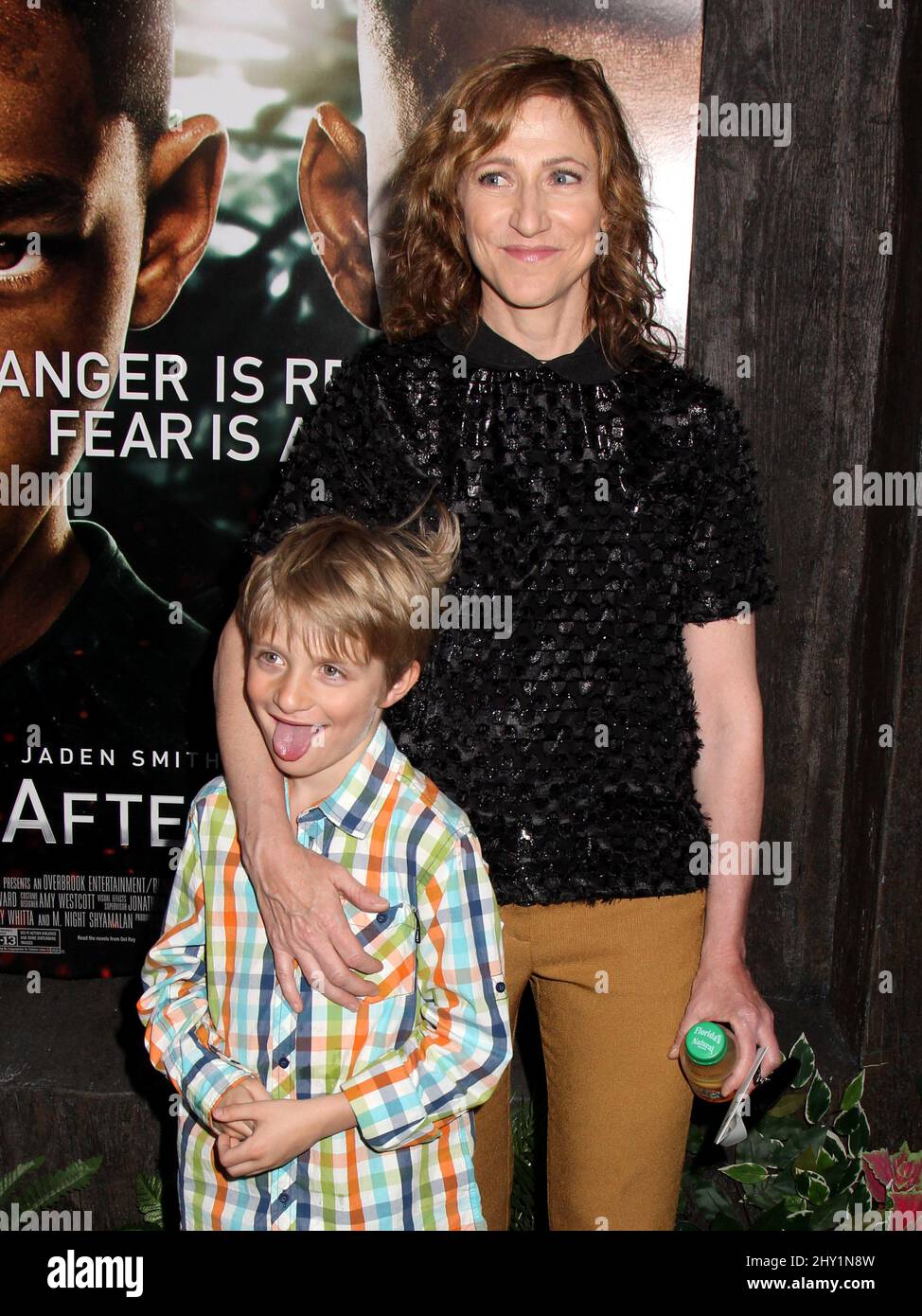 Edie Falco and Anderson Falco attending the premiere of "After Earth ...