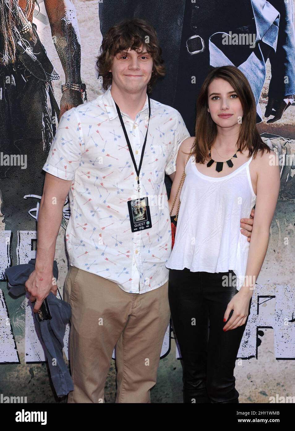 Evan Peters and Emma Roberts attending "The Lone Ranger" World Premiere ...