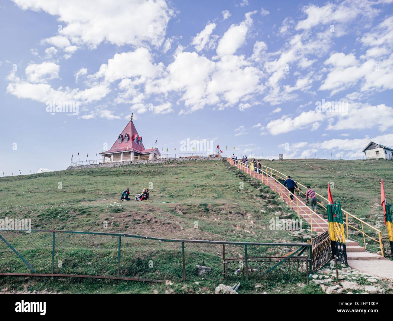 Beautiful view of the Maharani temple under the blue sky with clouds ...