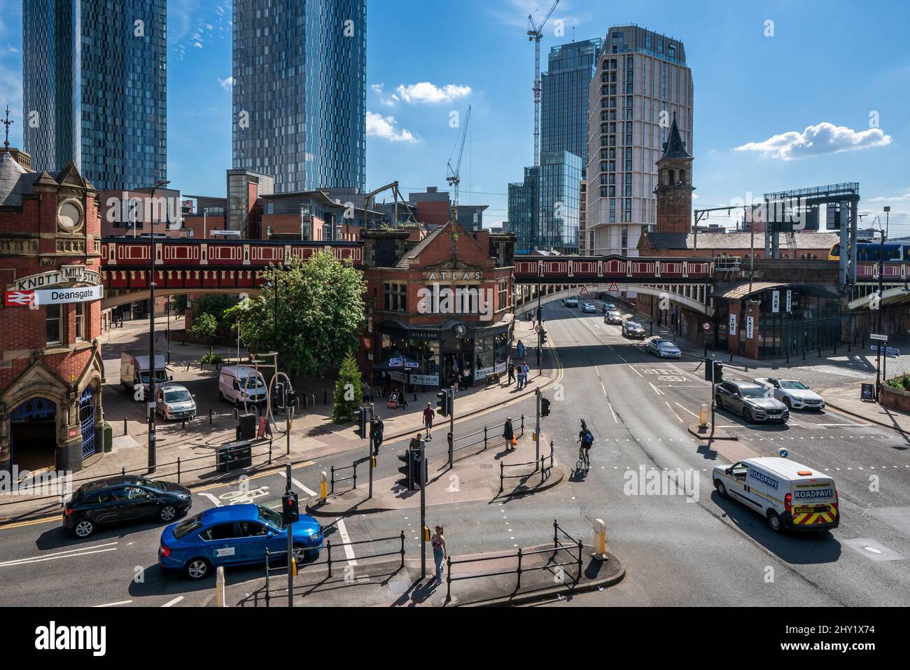 Cityscape of Deansgate outside the Deansgate Station in Manchester ...