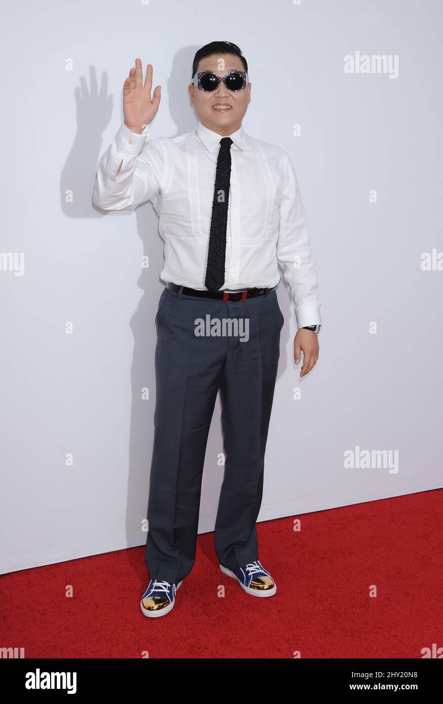 Psy arrive at the LA premiere of "Red 2" at the Westwood Village on ...