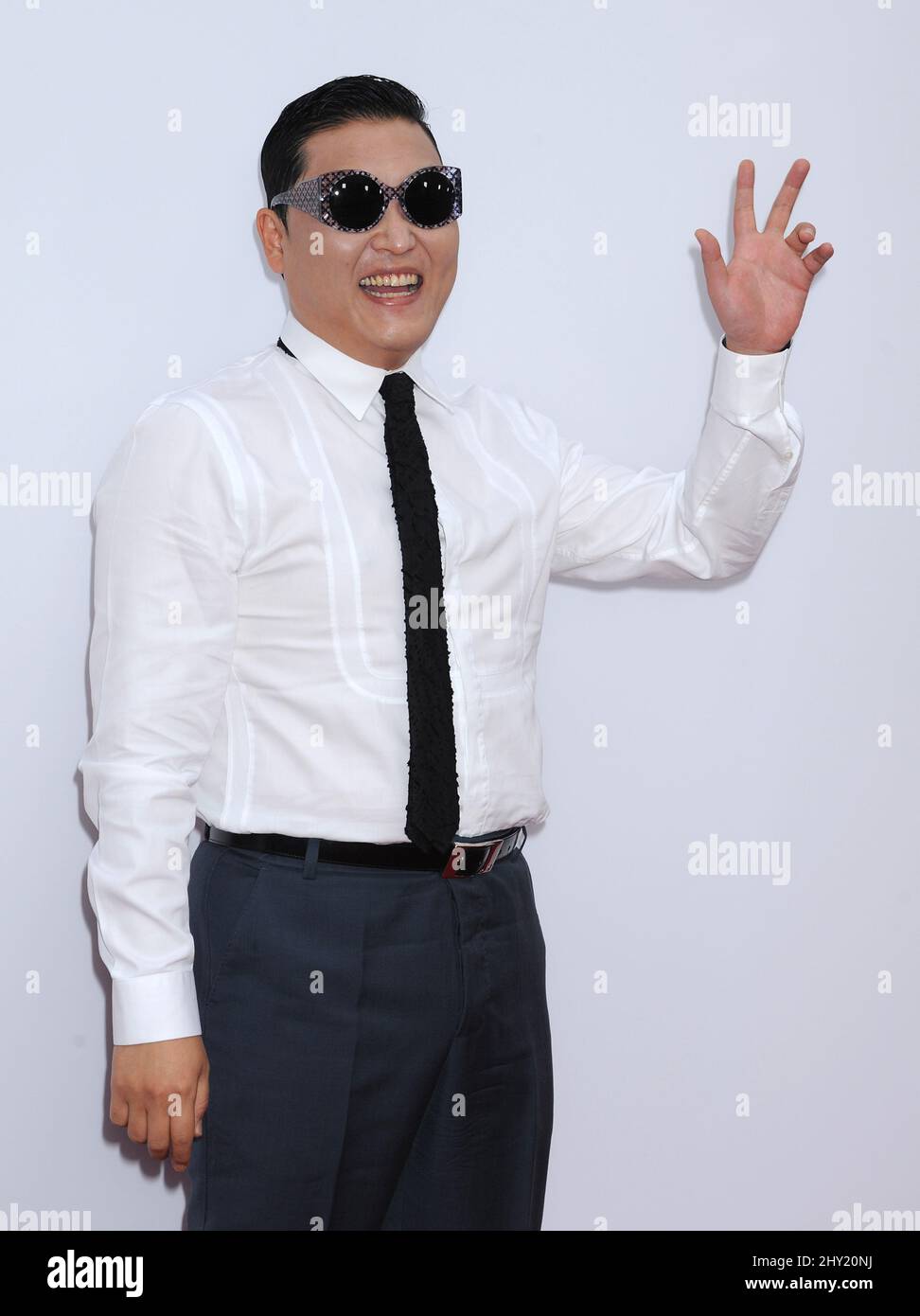 Psy arrive at the LA premiere of "Red 2" at the Westwood Village on ...