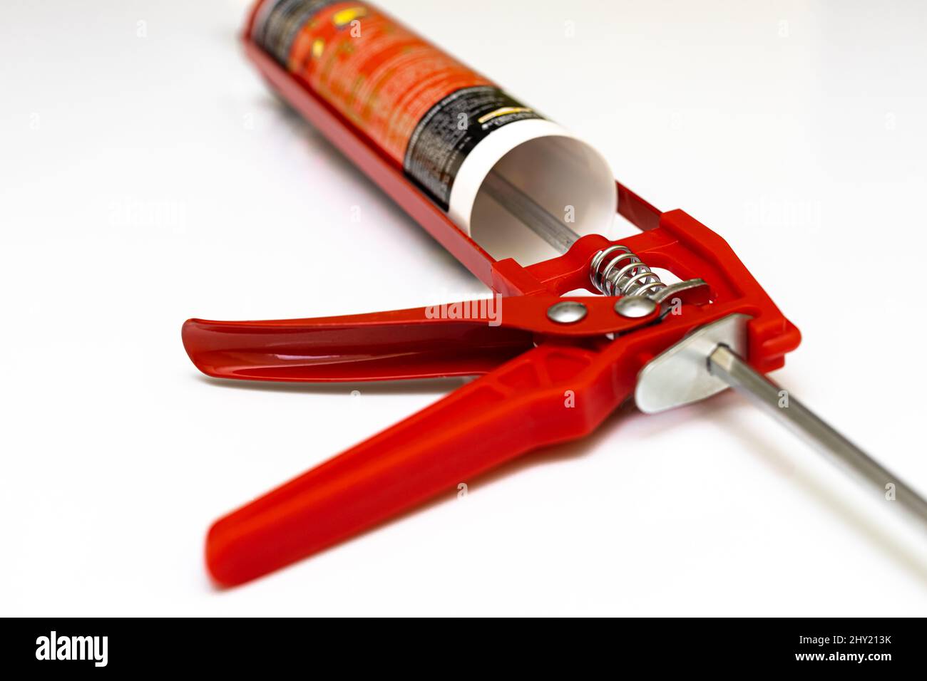 red caulk gun isolated on white background. High quality photo Stock ...