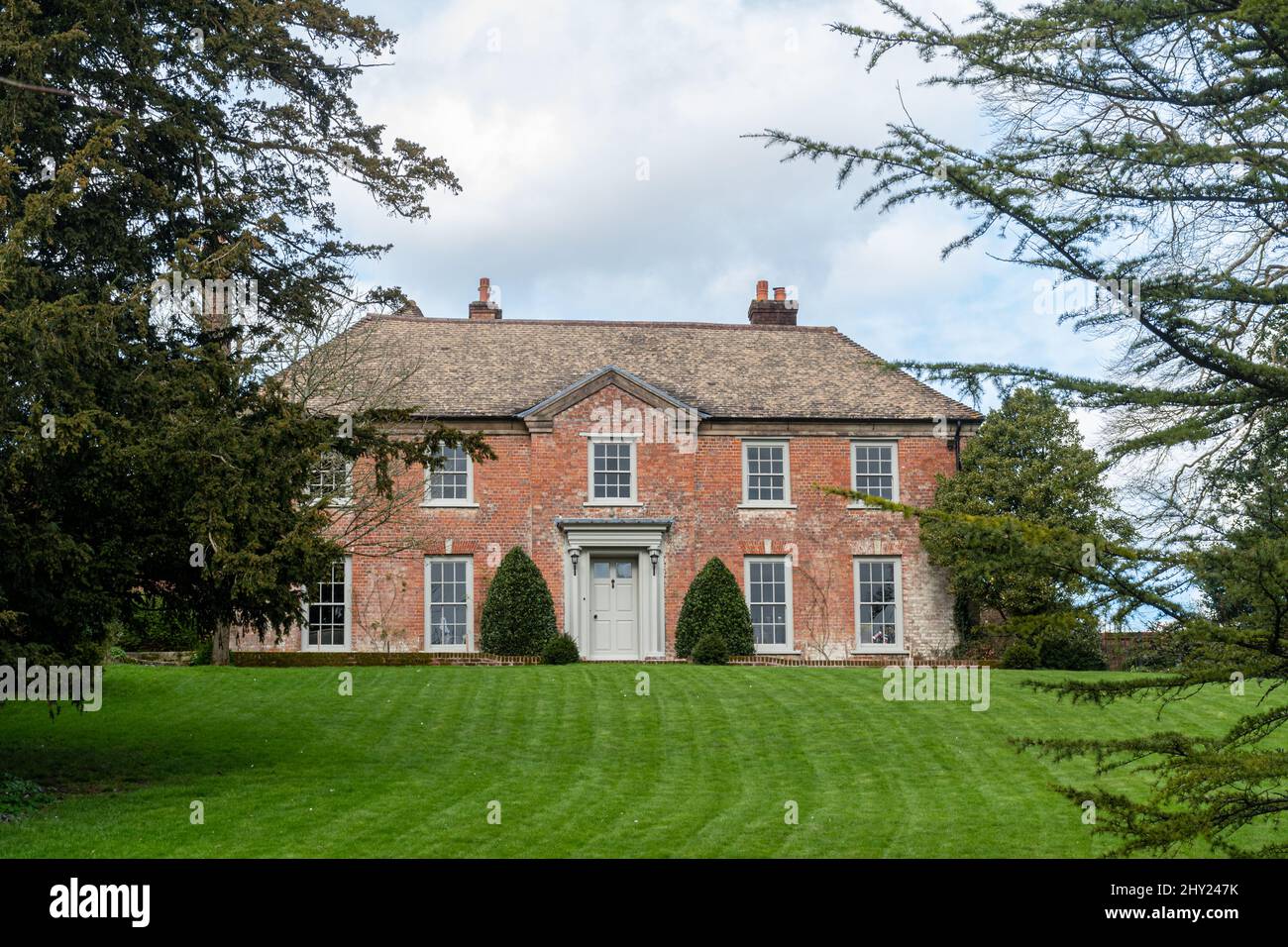 Court Farm House and garden in Overton, a Hampshire village, England ...