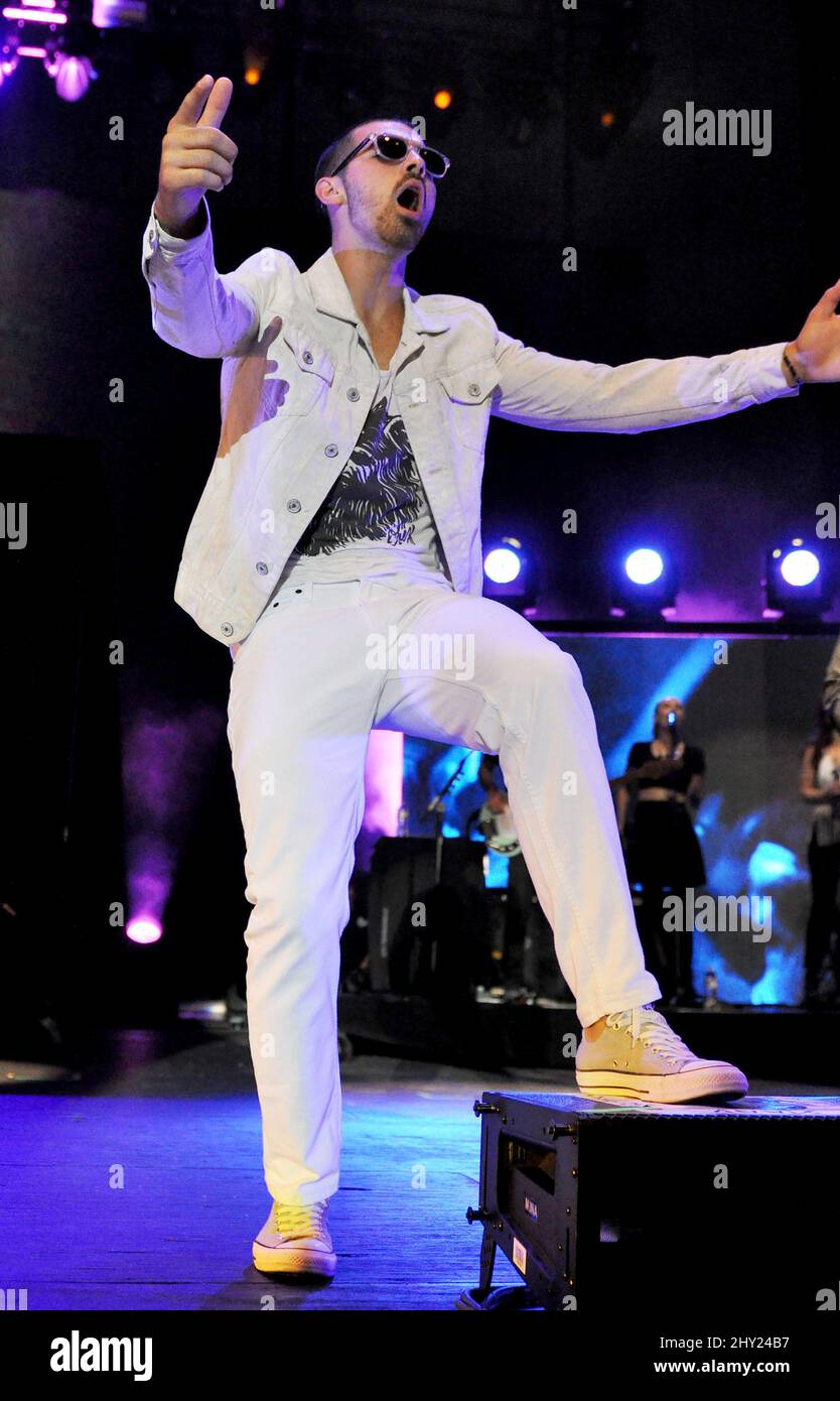 Joe Jonas on stage during the Jonas Brothers 'Summer Tour' concert at ...