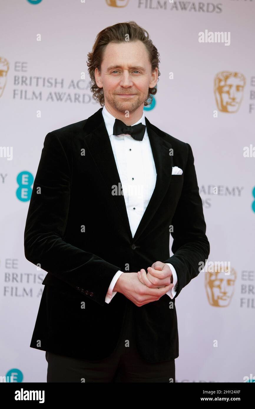 London, UK. Tom Hiddleston at the EE BAFTA British Academy Film Awards ...