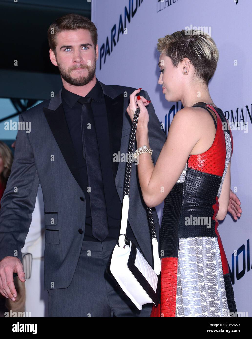 Liam Hemsworth Paranoia Premiere Miley Cyrus & Liam Hemsworth Hit Red