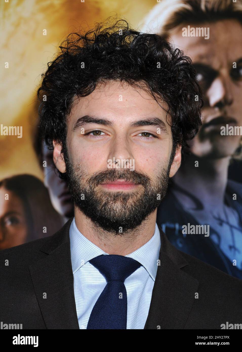 Aidan Turner attending the premiere of 'The Mortal Instruments: City of ...
