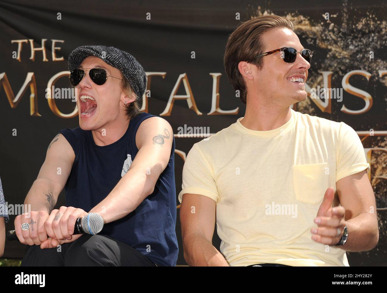 Jamie Campbell Bower and Kevin Zegers attending a "Mortal Instruments ...