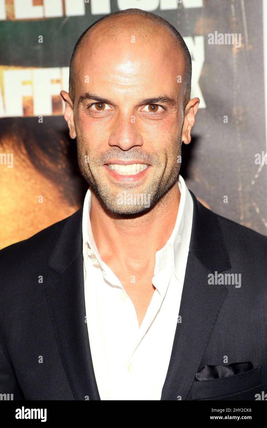 Christian George attending the 'Runner Runner' premiere held at Planet ...