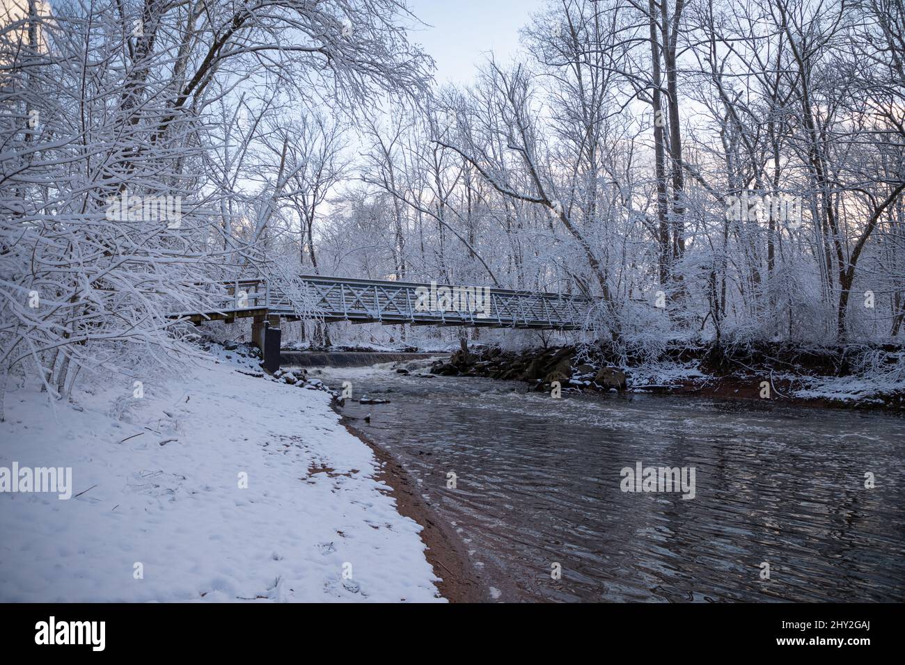Bridge over snowy river hi-res stock photography and images - Alamy
