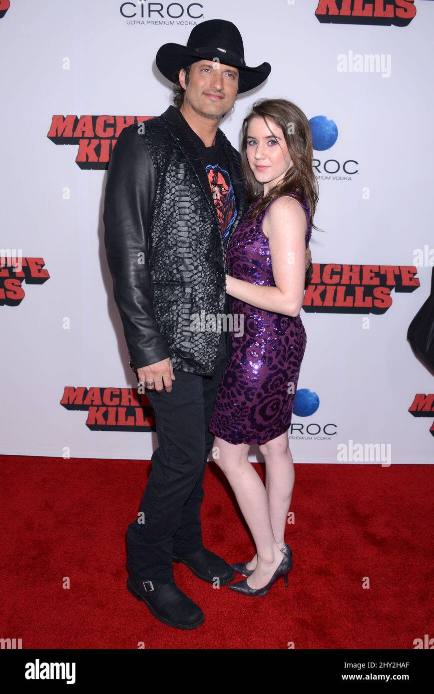 Robert Rodriguez & Marci Madison attending the 'Machete Kills' Los ...
