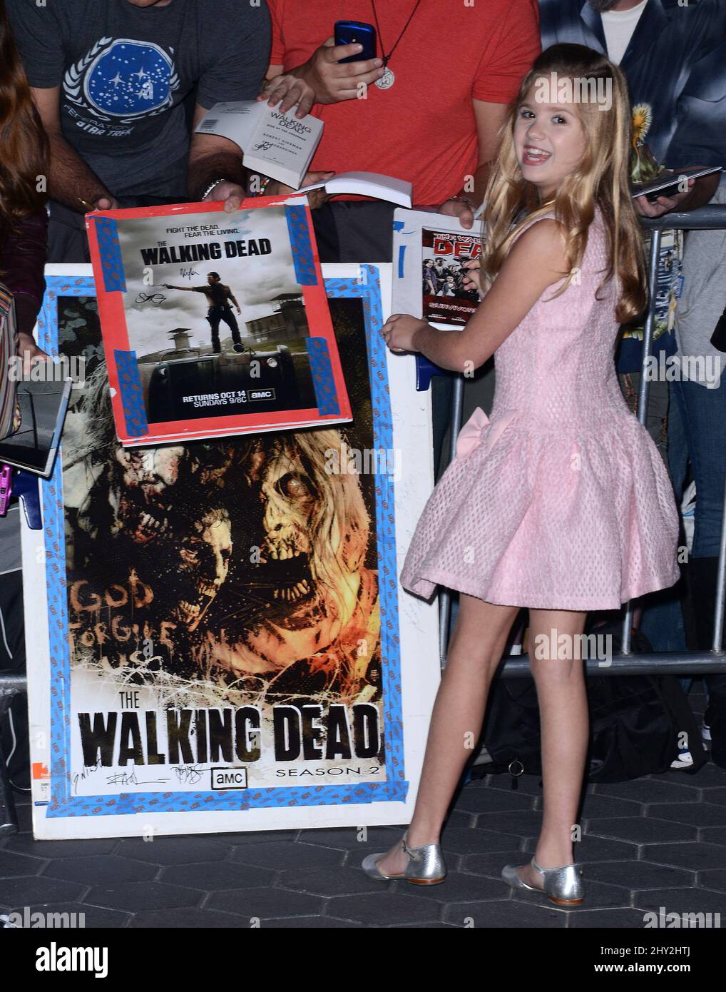Kyla Kenedy attending the premiere of season four of The Walking Dead ...