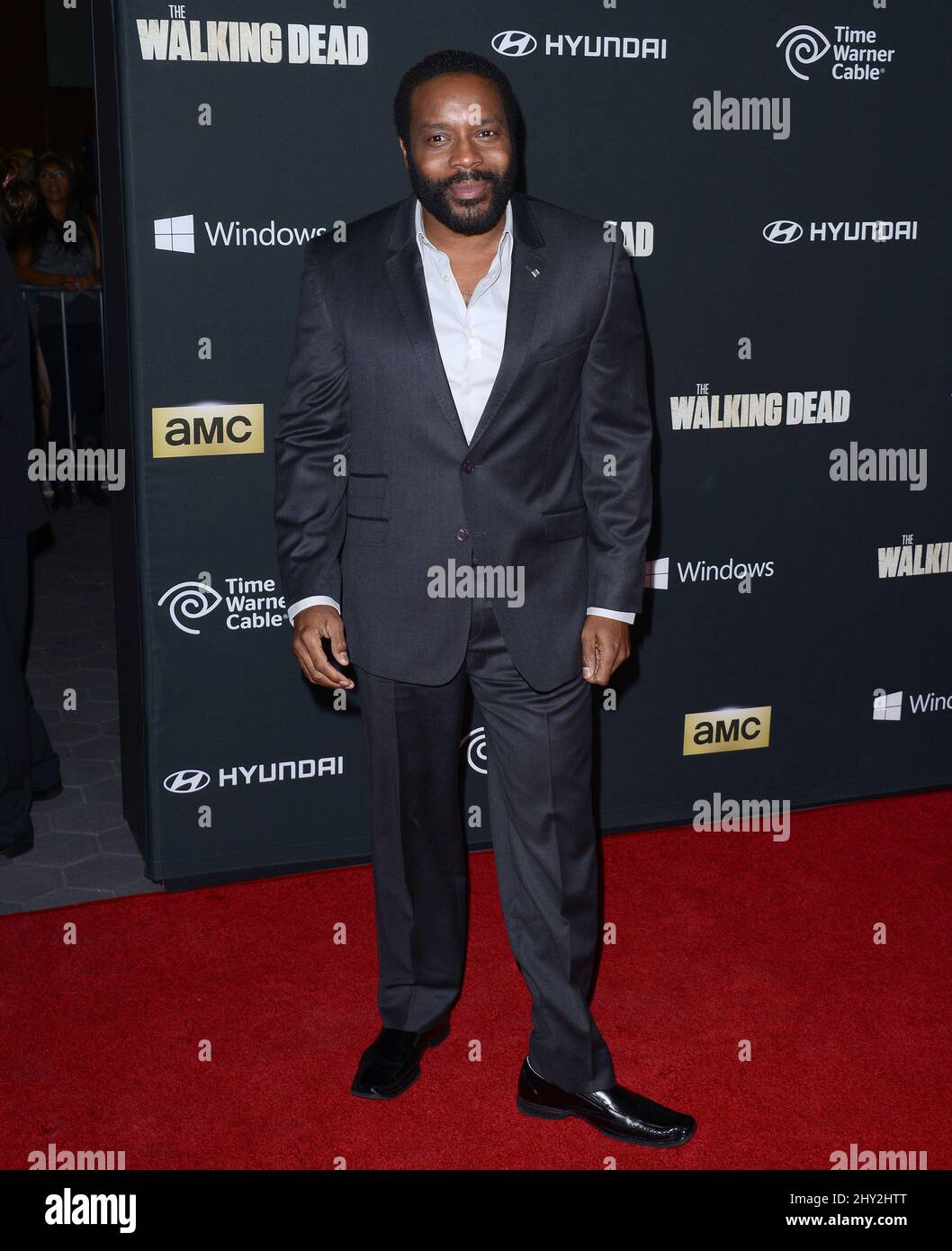 Chad Coleman attending the premiere of season four of The Walking Dead ...