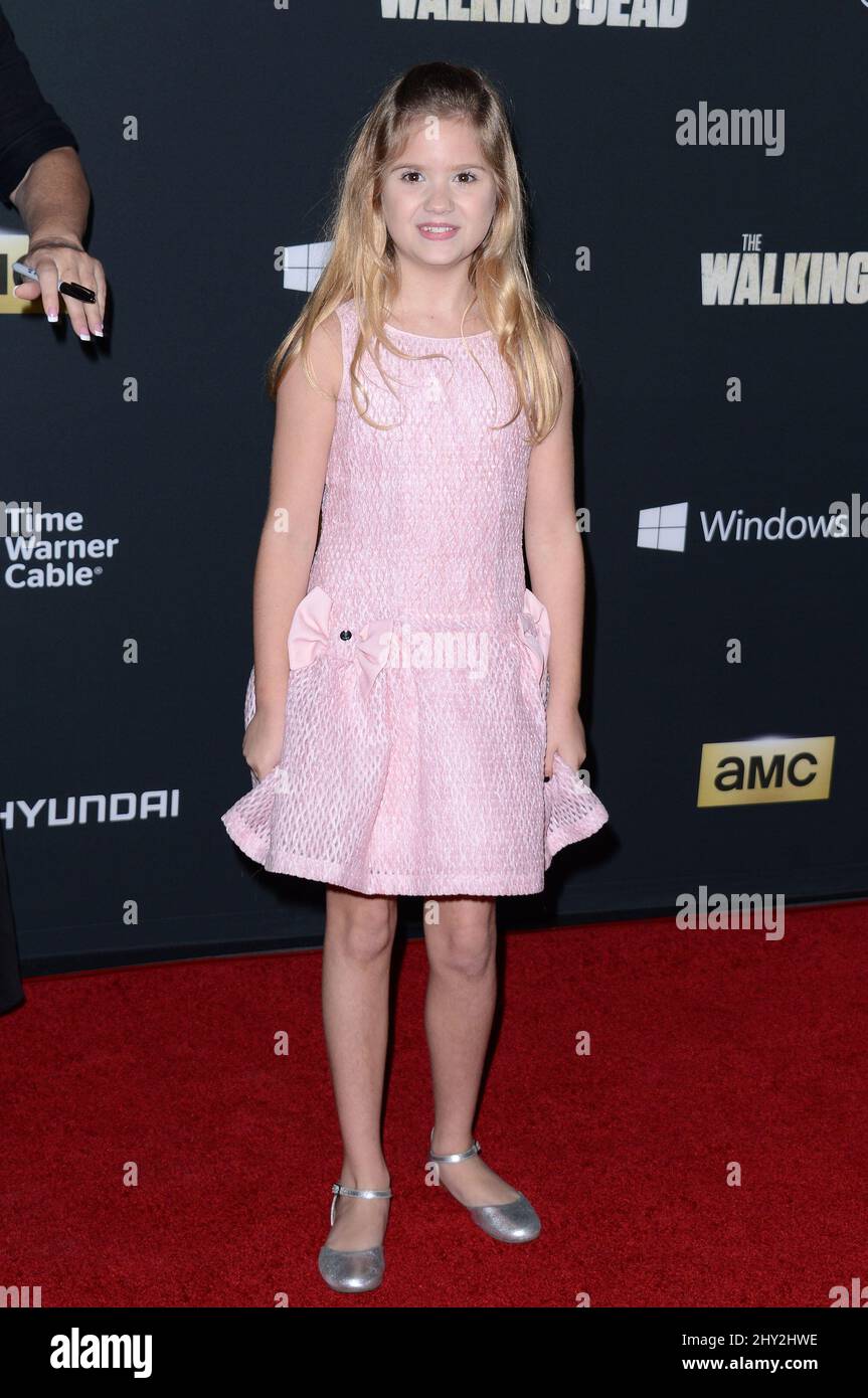 Kyla Kenedy attending the premiere of season four of The Walking Dead ...