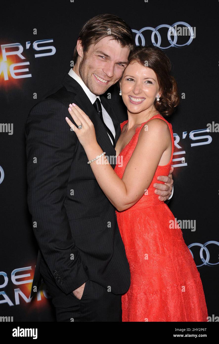 Liam McIntyre & Erin McIntyre attending the "Ender's Game" Premiere ...