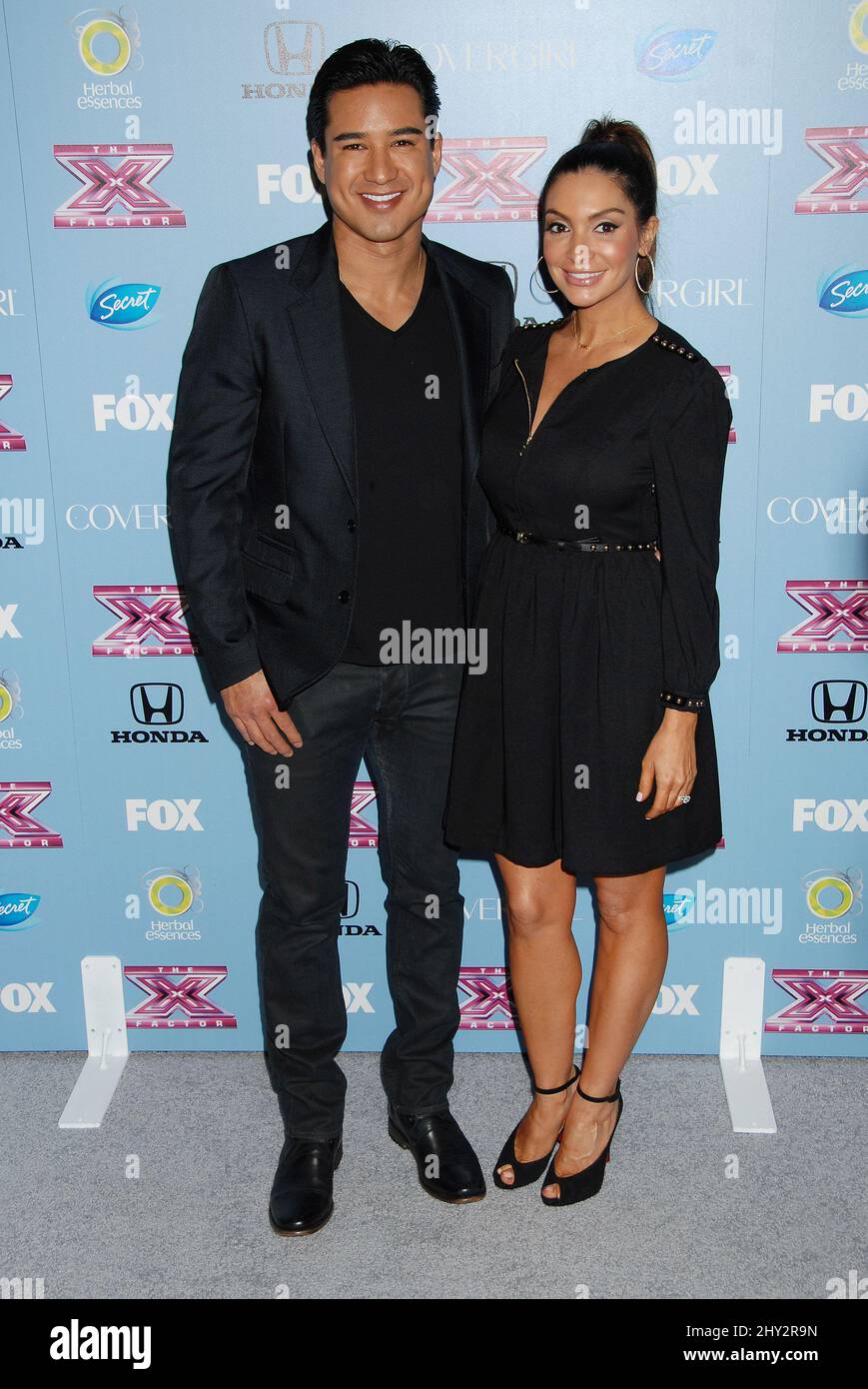 Mario Lopez and Courtney Laine Mazza attending tThe X Factor Finalist ...