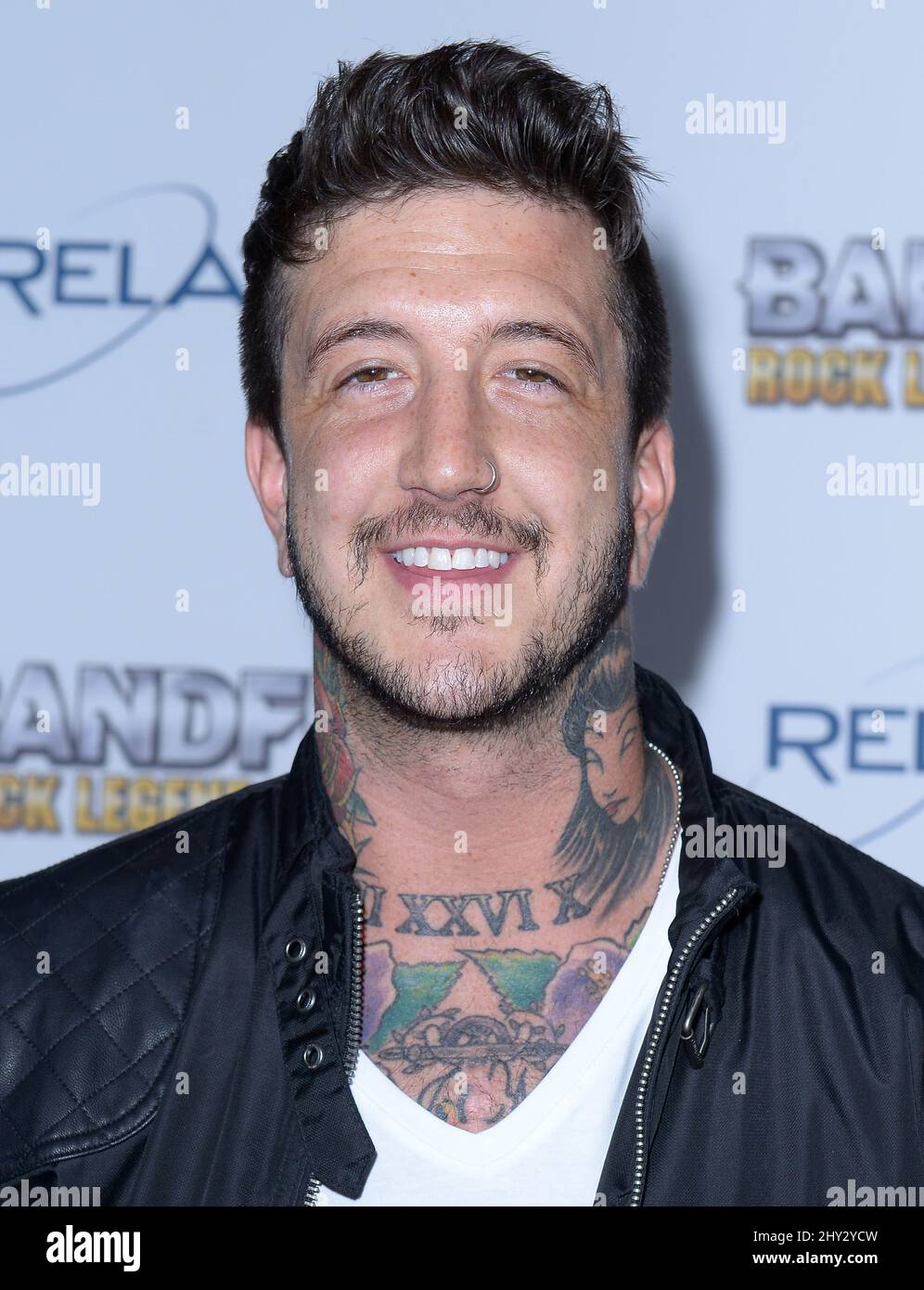 Austin Carlile arrives at the "Bandfuse: Rock Legends" video game ...