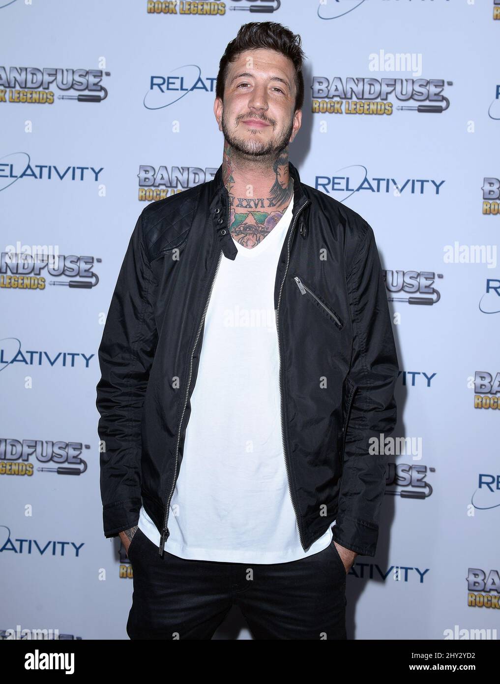 Austin Carlile arrives at the "Bandfuse: Rock Legends" video game ...