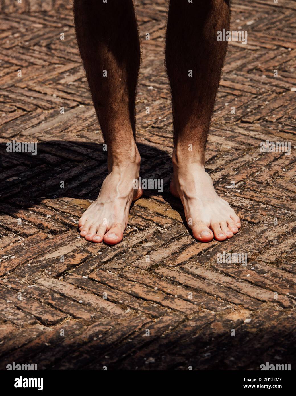 Hairy man feet hi-res stock photography and images - Alamy