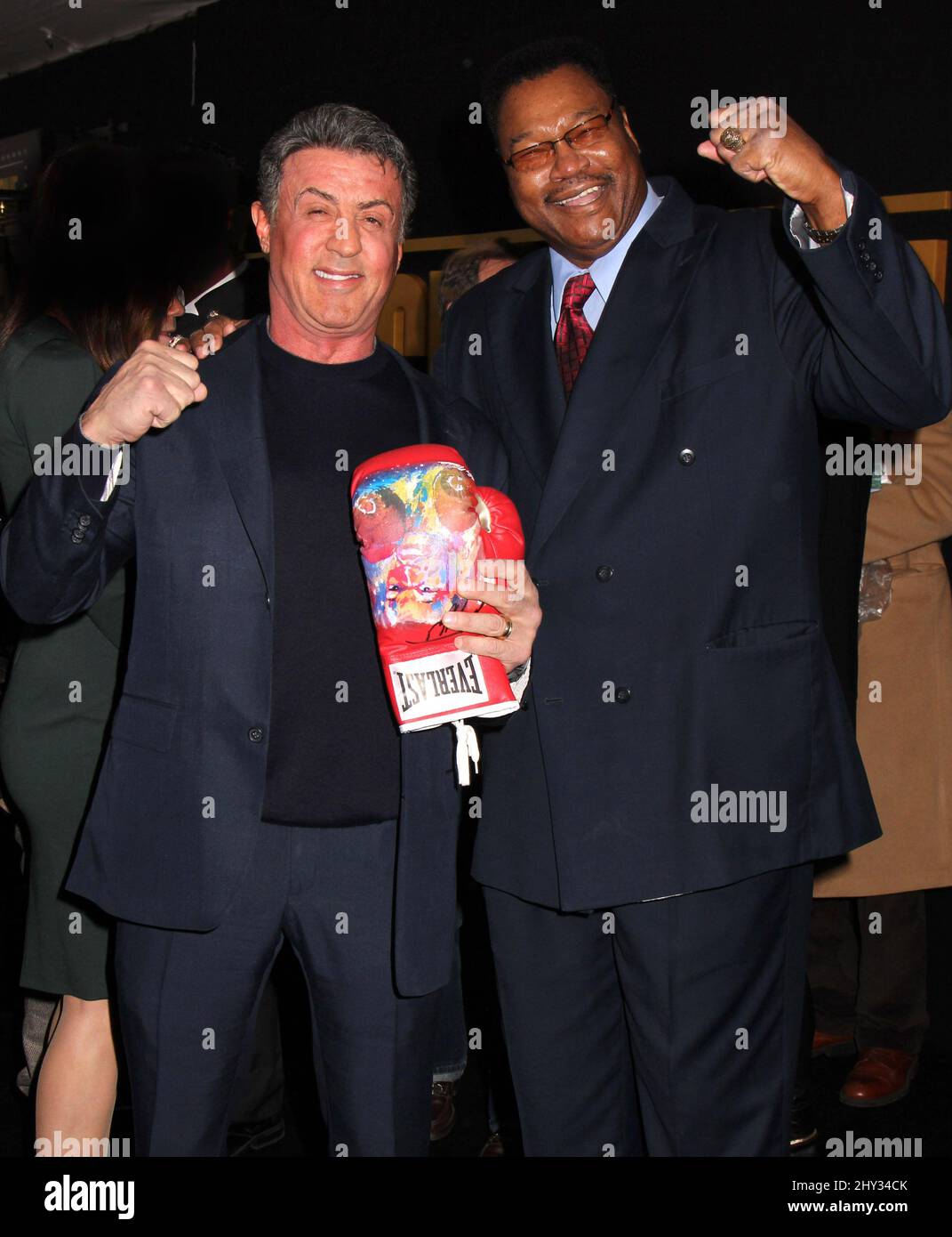 Sylvester Stallone and Larry Holmes attending the premiere of "Grudge ...