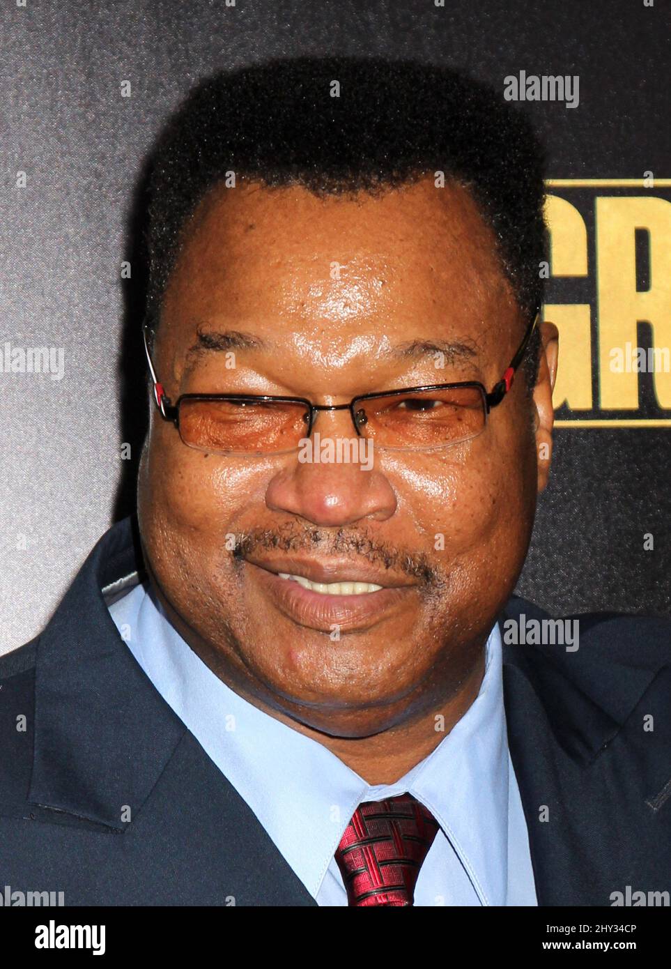 Larry Holmes attending the premiere of "Grudge Match" at the Ziegfeld ...