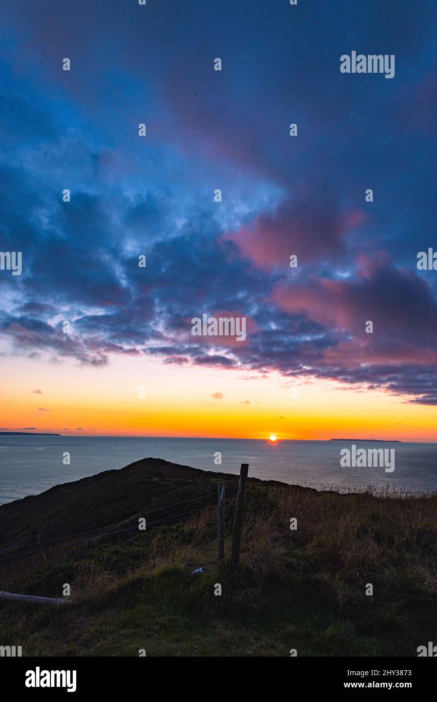Bird-eye view of sea at sunset from the hill Stock Photo - Alamy