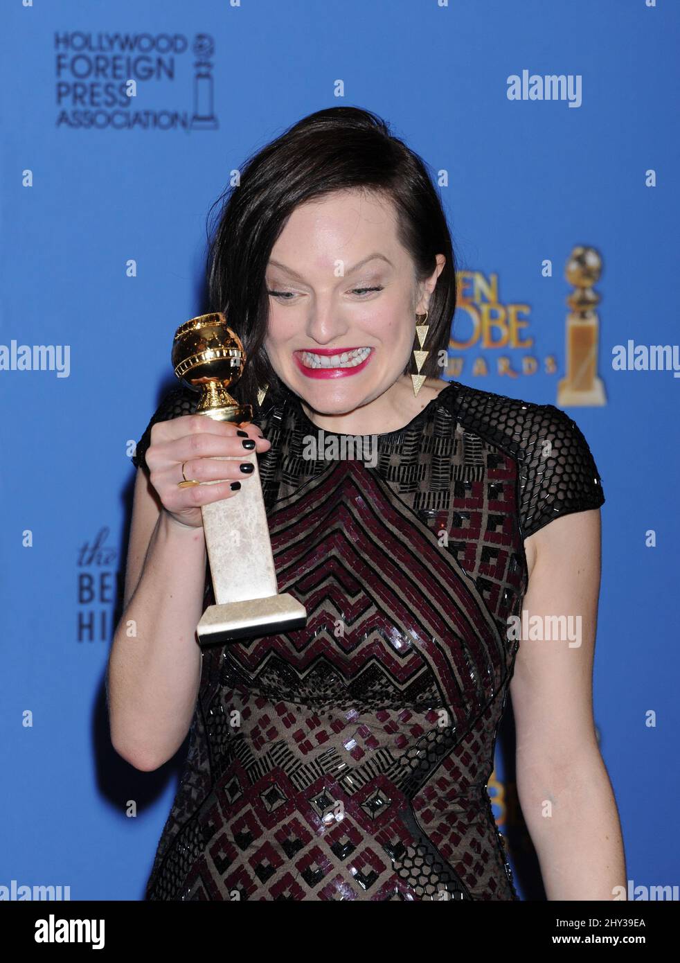 Elizabeth Moss in the press room of the 71st Annual Golden Globe Awards ...