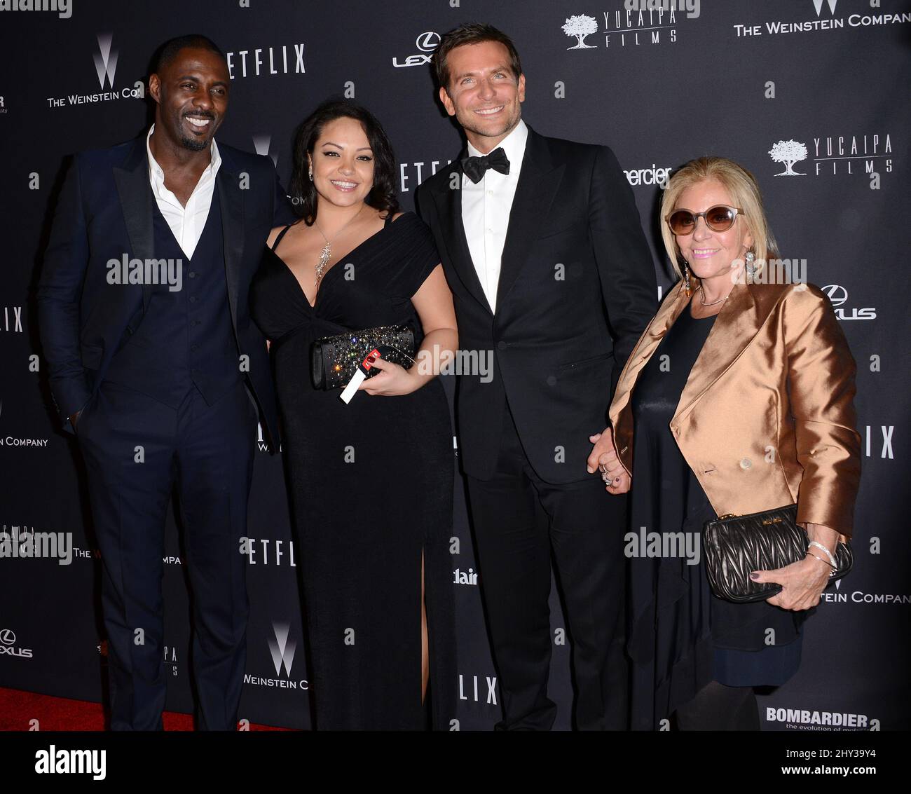 Idris Elba, Bradley Cooper attending The Weinstein Company 2014 Golden ...