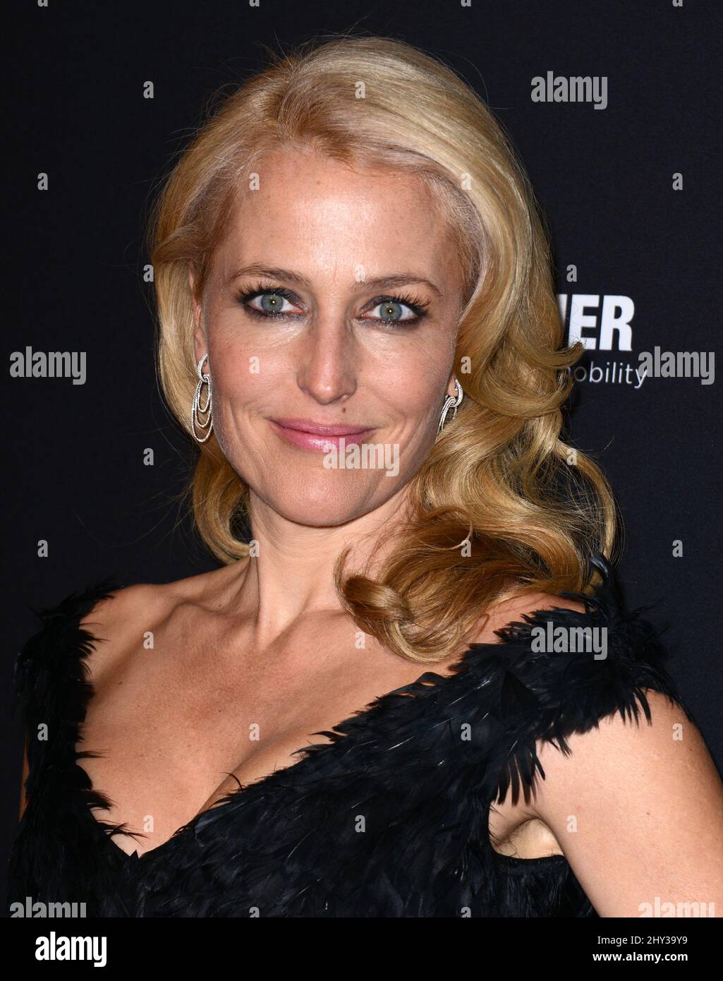 Gillian Anderson attending The Weinstein Company 2014 Golden Globes ...