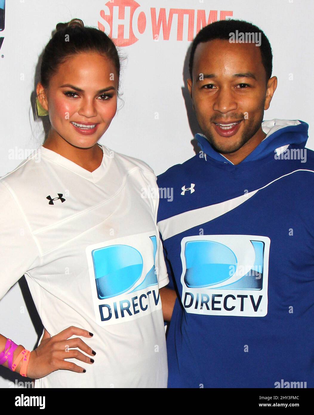Chrissy Teigen and John Legend attending DIRECTV's 8th Annual Celebrity ...