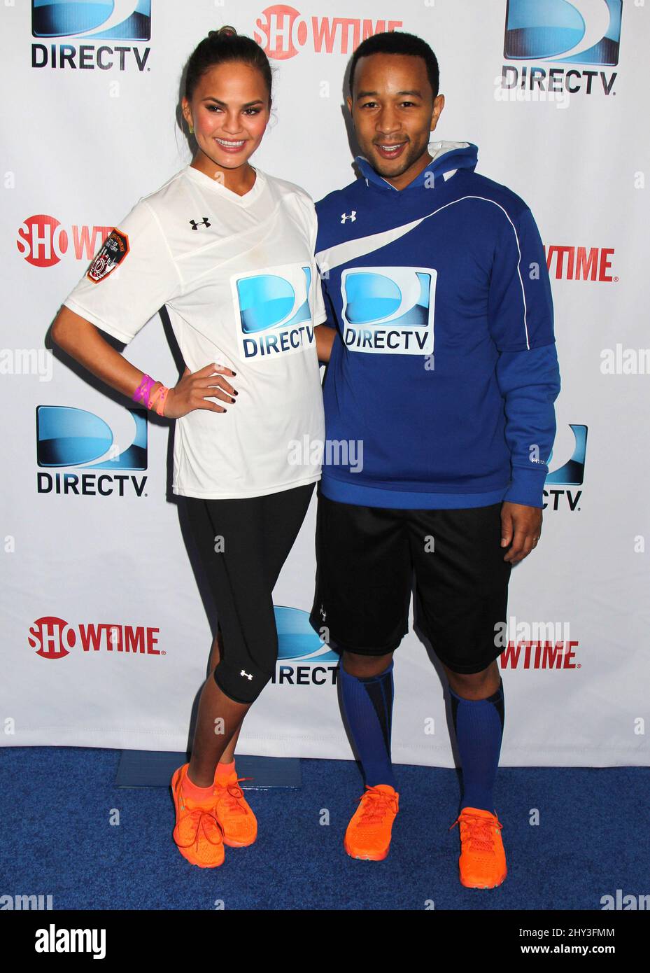 Chrissy Teigen and John Legend attending DIRECTV's 8th Annual Celebrity ...
