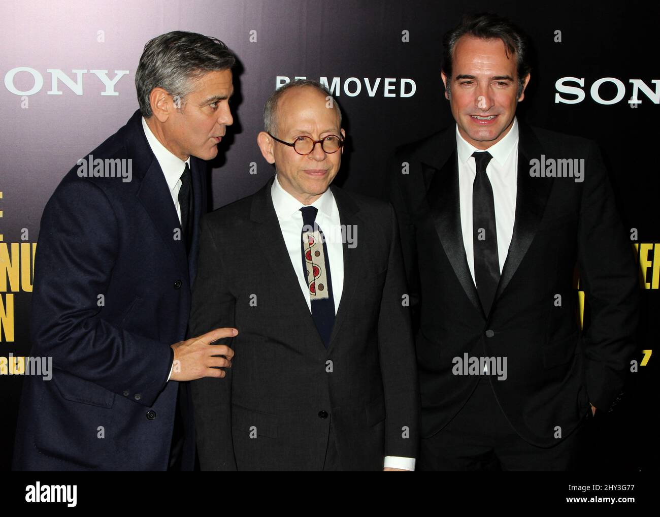 George Clooney, Bob Balaban and Jean Dujardin attending "The Monuments ...