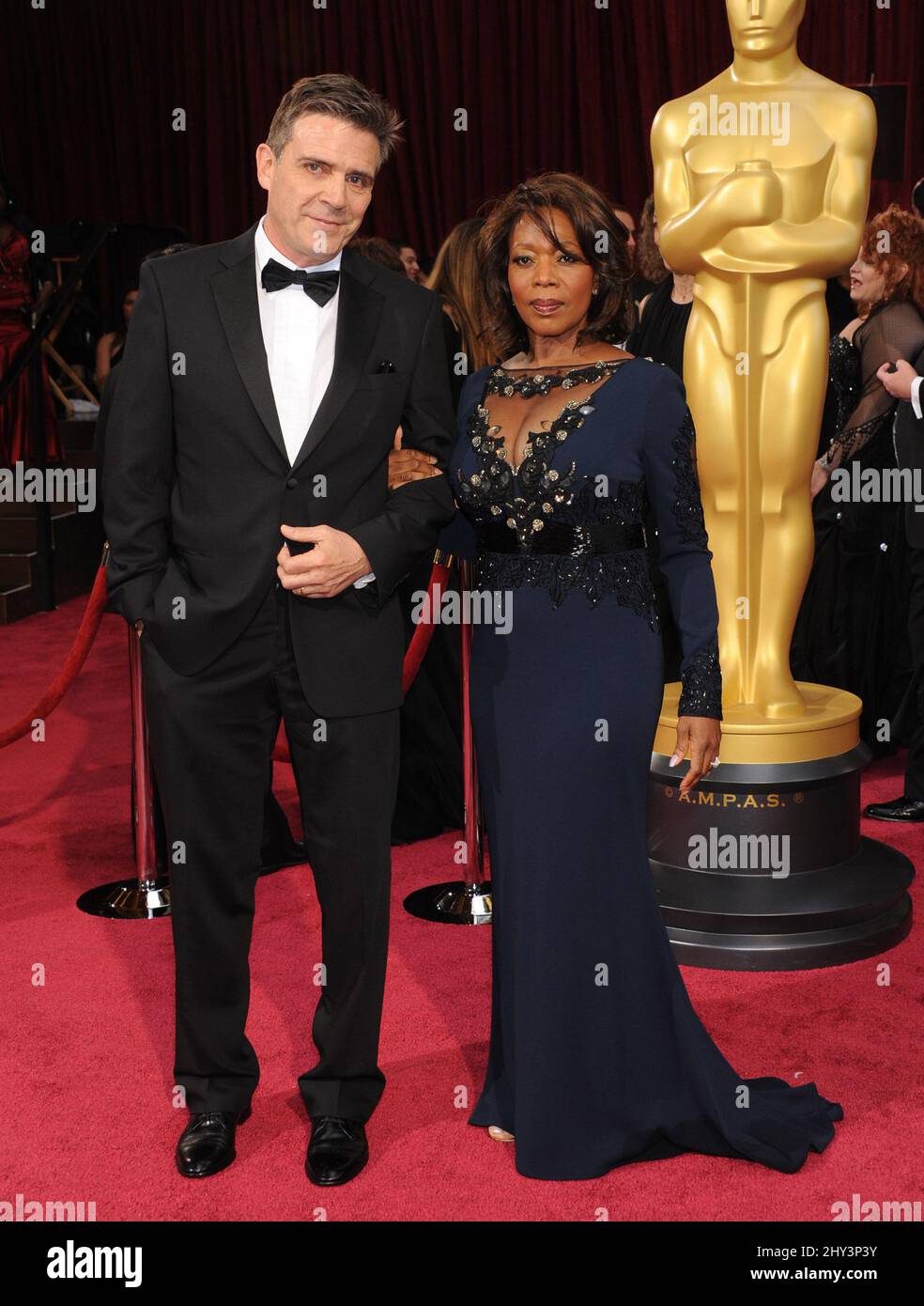Roderick Spencer and Alfre Woodard arriving at the 86th Academy Awards ...
