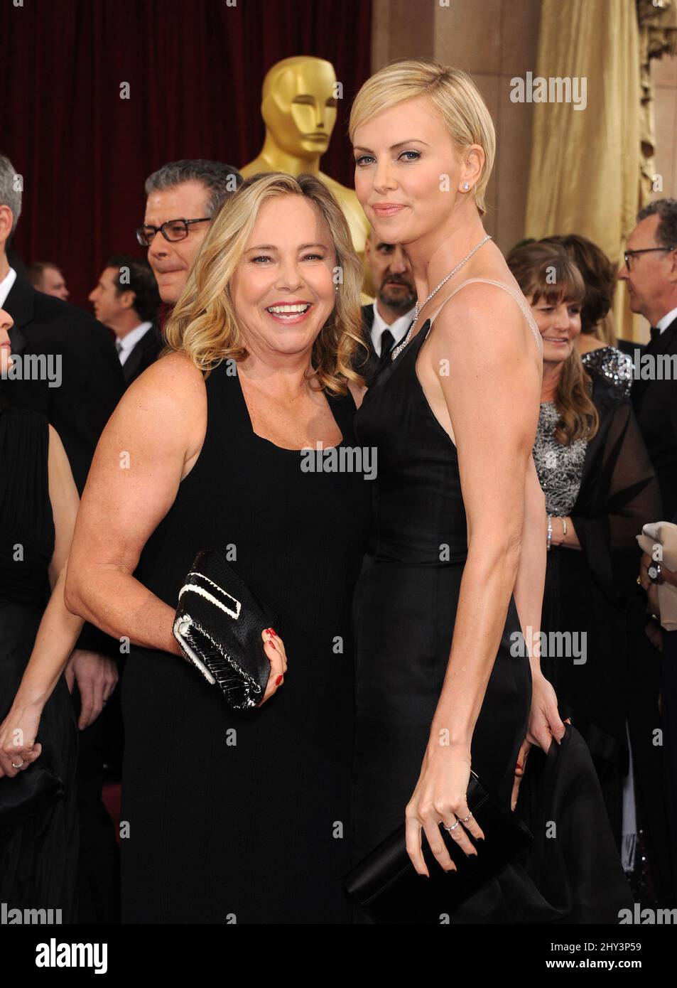 Charlize Theron and Gerda Maritz arriving at the 86th Academy Awards ...